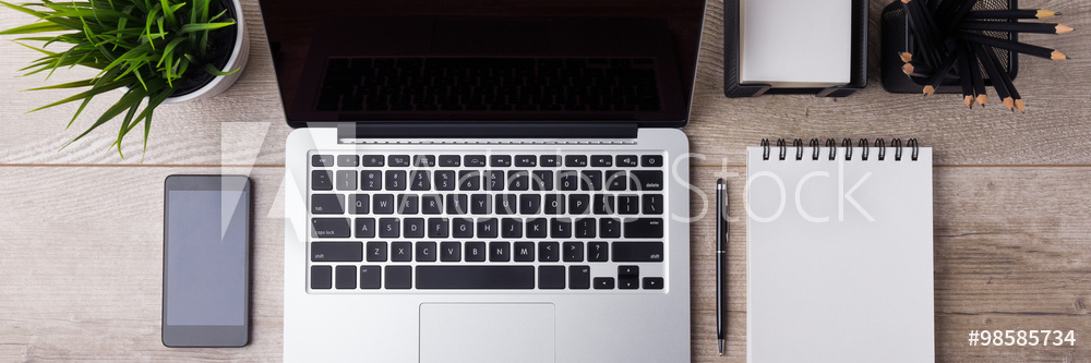 Laptop and Notepad | Benefit Trust